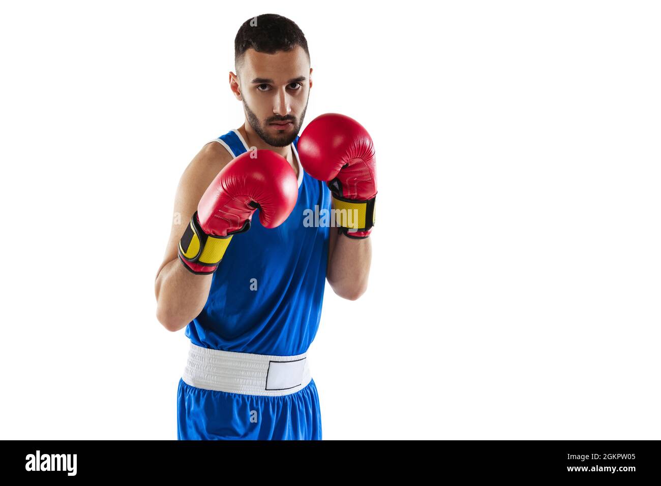 Cropped image of one professional boxer in blue uniform training ...