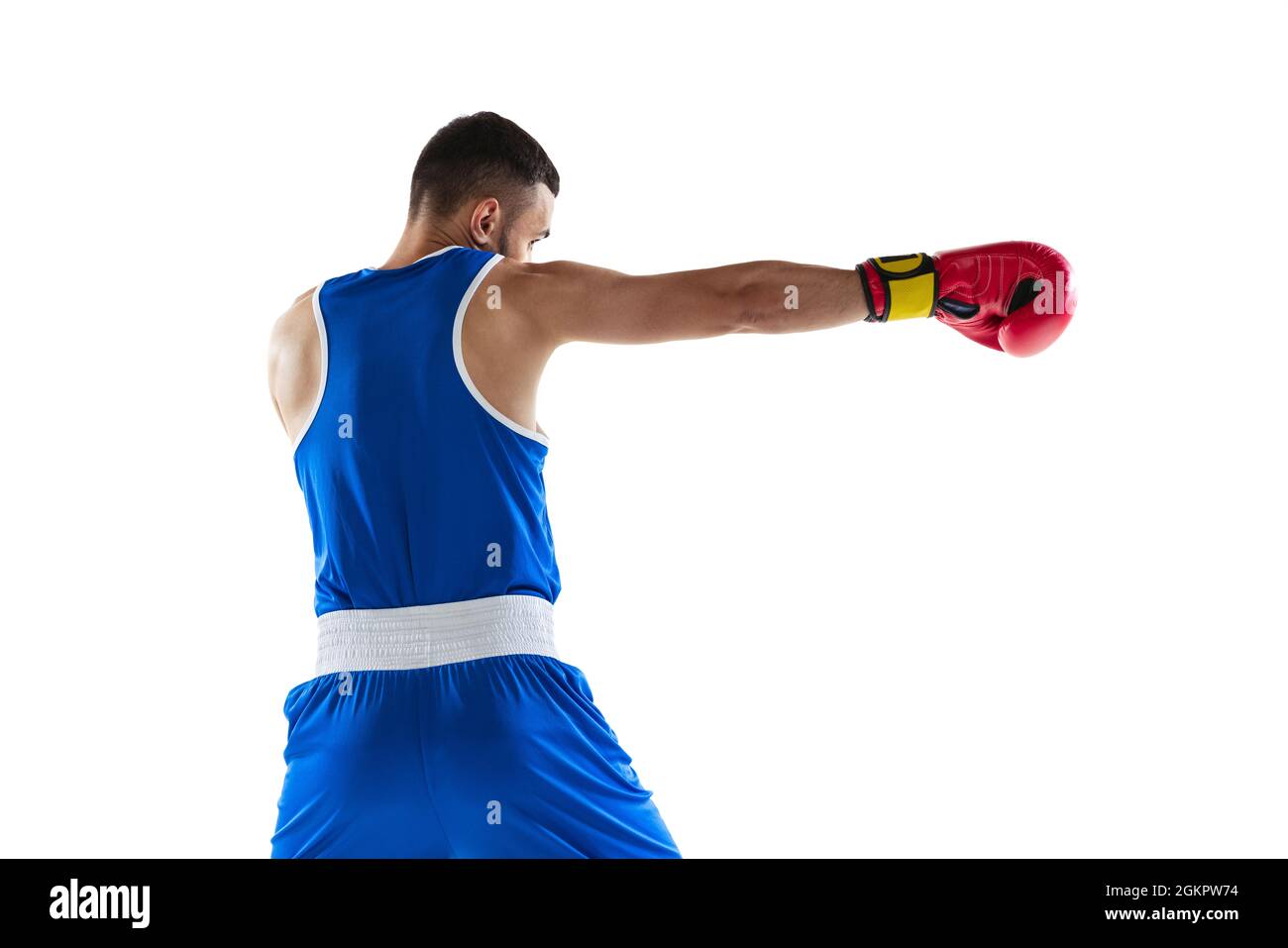 Cropped portrait of professional boxer in blue uniform training ...