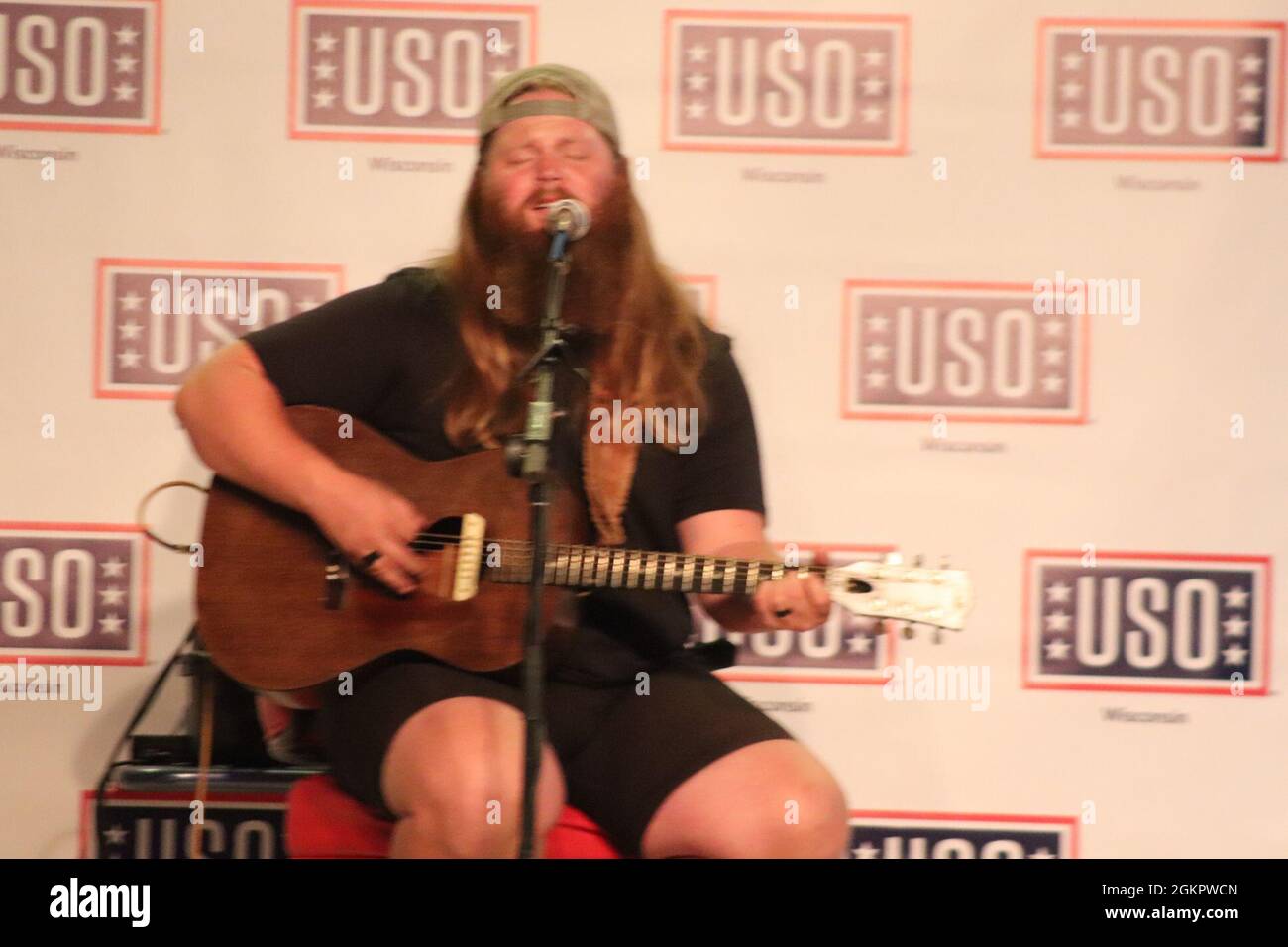 Entertainer and musician Chris Kroeze sings a song June 15, 2021 ...