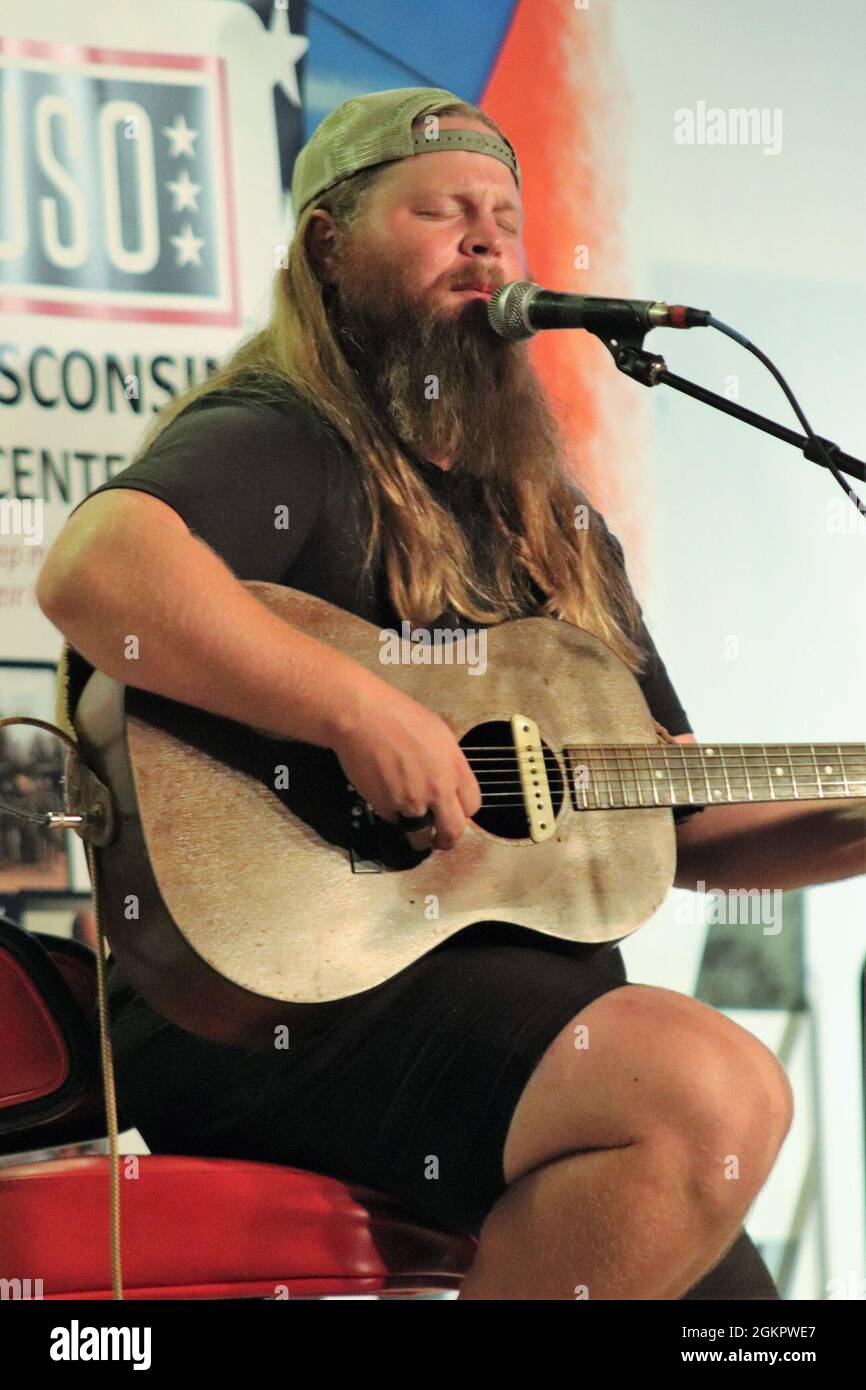 Entertainer and musician Chris Kroeze sings a song June 15, 2021 ...