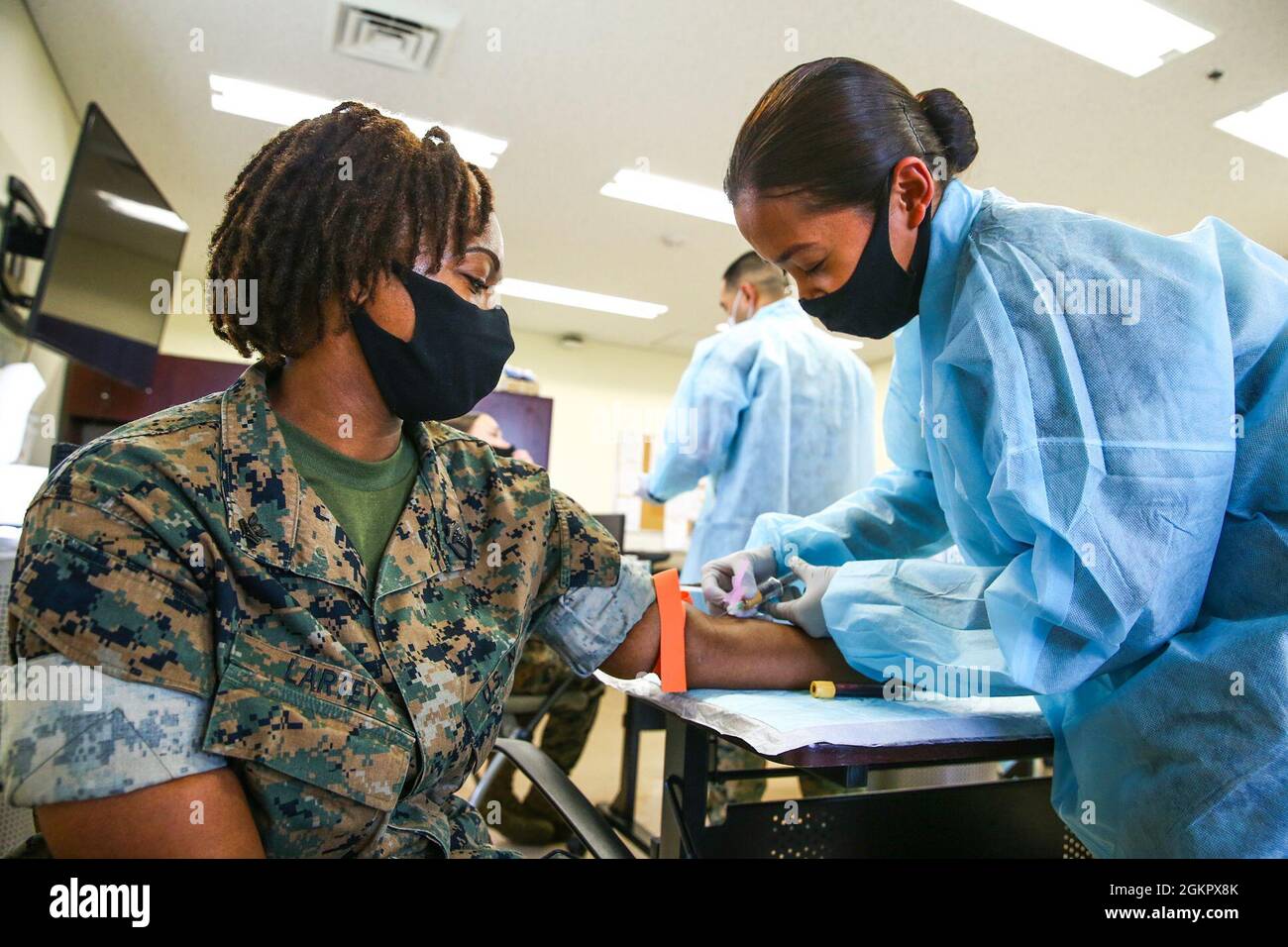 U.S. Navy Petty Officer Second Class Kimberly Data, right, hospital ...