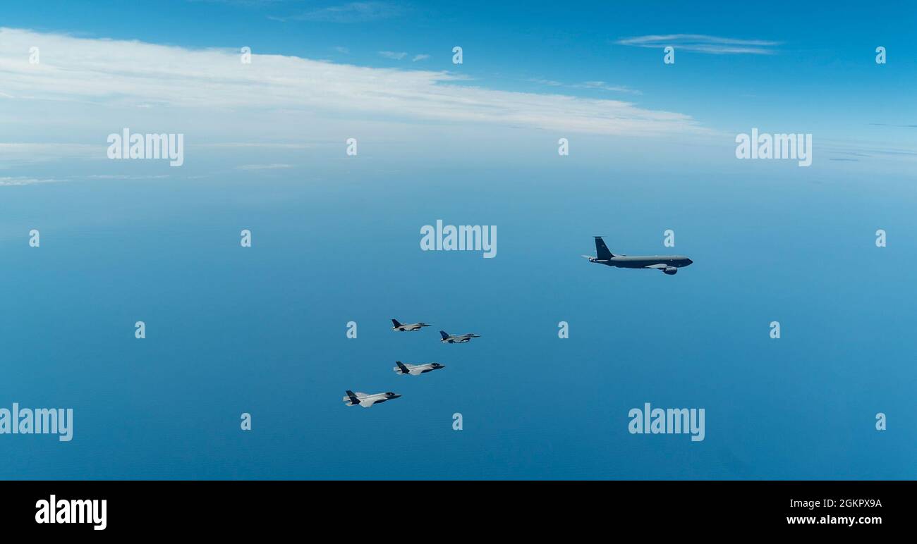 U.S. Air Force F-16C and F-35A aircraft conduct in-flight refueling ...