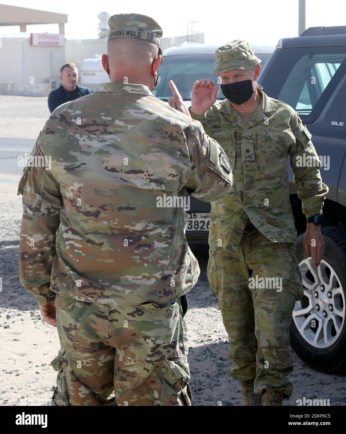 Australian Maj. Gen. Chris Field, right, Deputy Commanding General ...