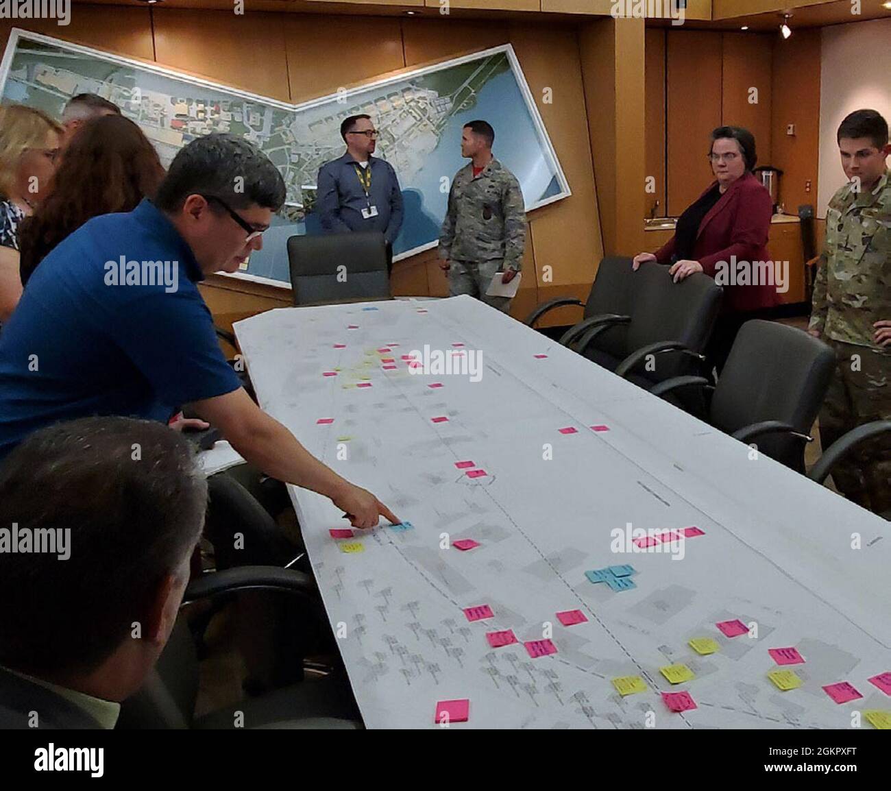Officials from Joint Base Langley-Eustis review the area development ...