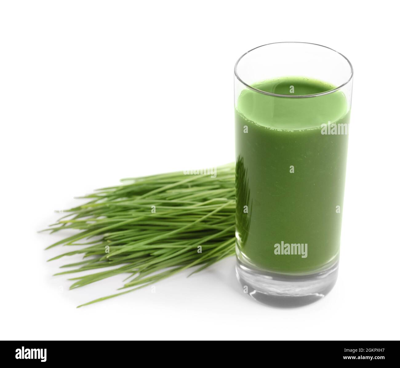 Shot of wheat grass drink on white background Stock Photo - Alamy