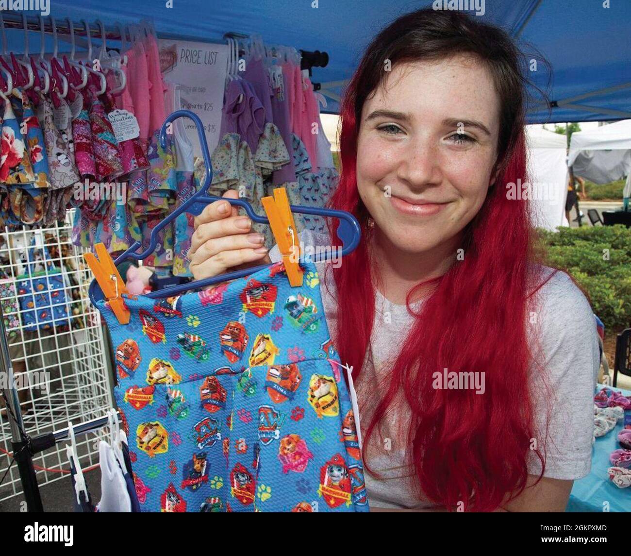 Jane Wells of Bailey's Bells shows off a pair of children's pants for ...