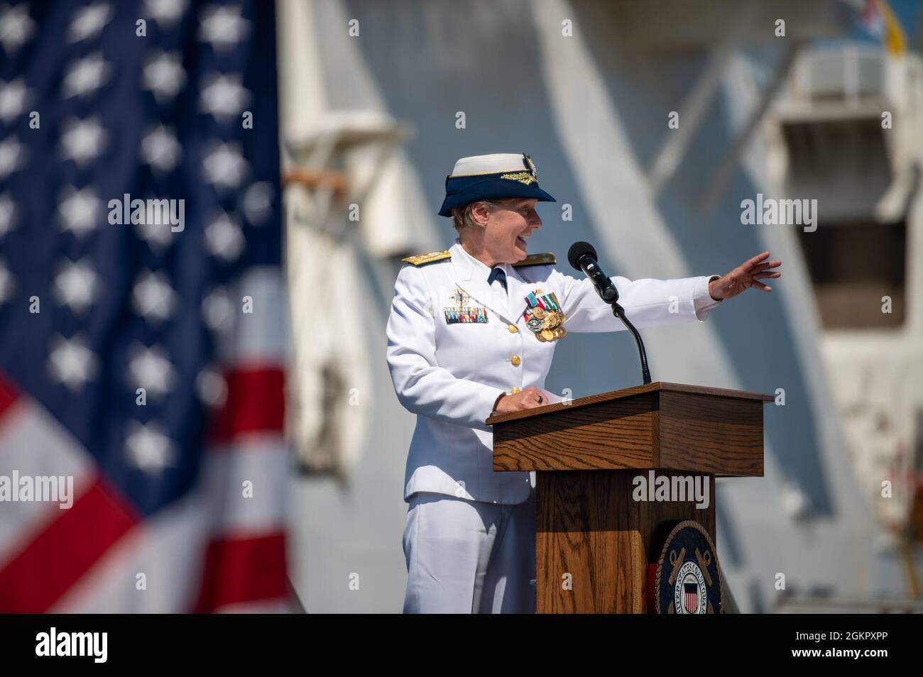Vice Adm. Linda L. Fagan shares a laugh with attendees during a change ...