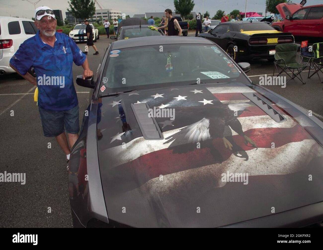 Larry Spring, a veteran, talks about the painting on the hood of the4 ...