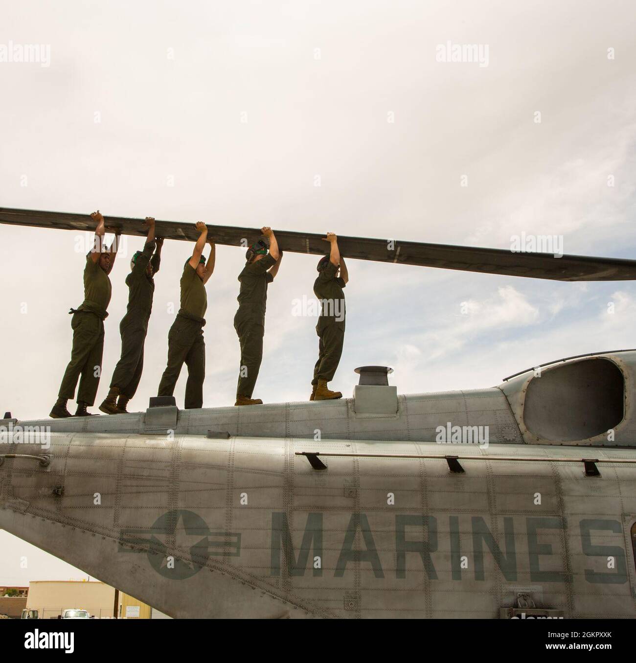 U.S. Marine Corps CH-53E aircraft maintainers attached to Marine Heavy ...