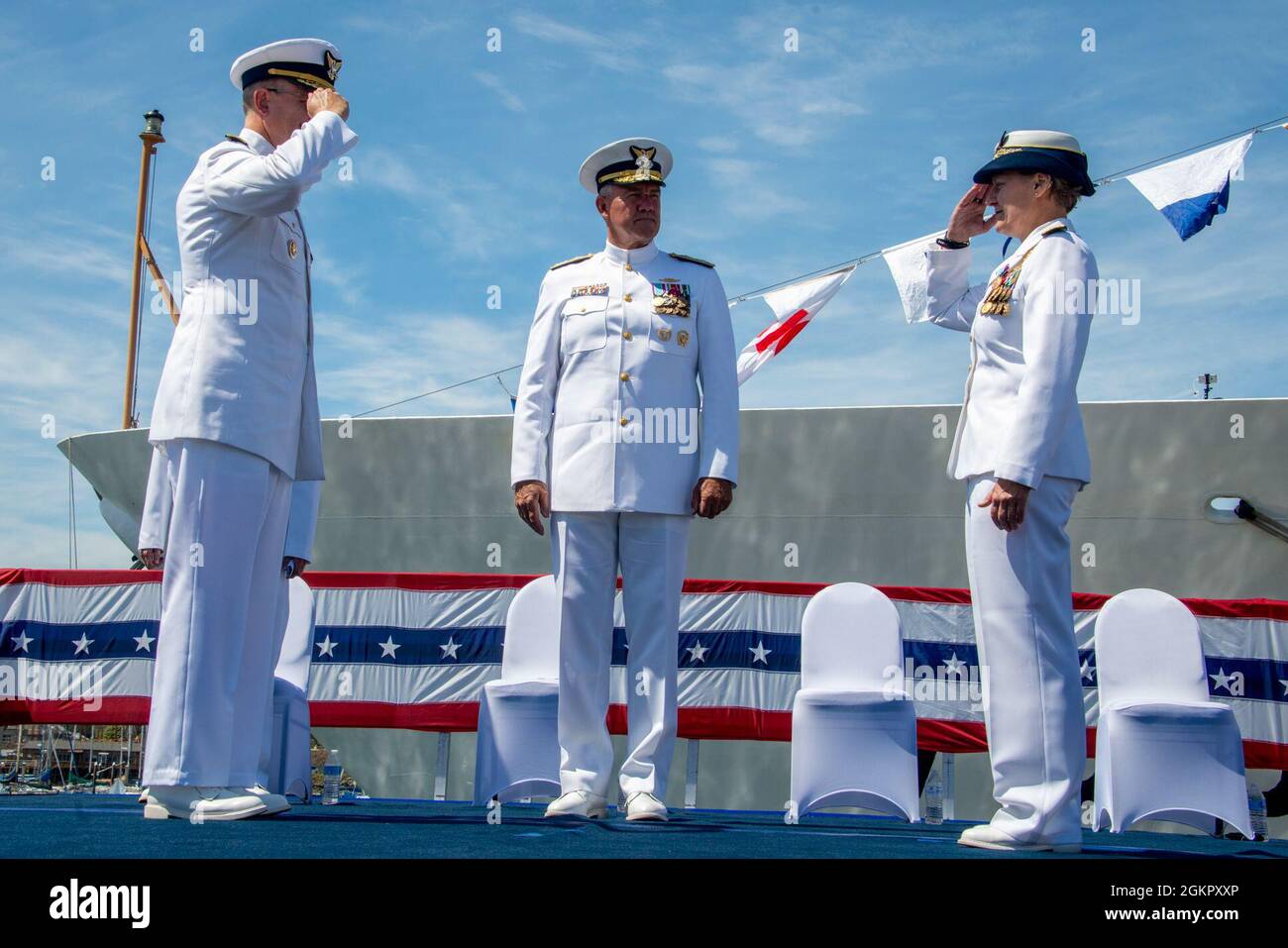Rear Adm. Peter W. Gautier (left) salutes Vice Adm. Linda L. Fagan ...