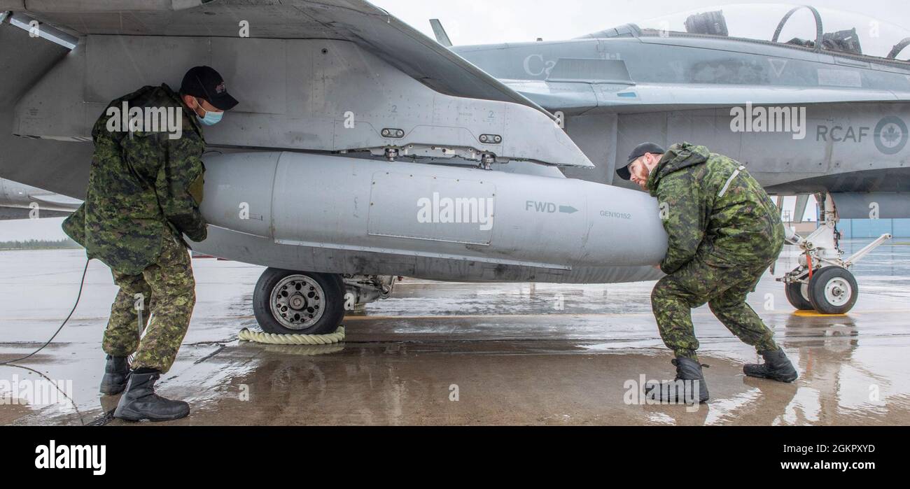 Two Royal Canadian Air Force (RCAF) aircraft maintenance technicians ...