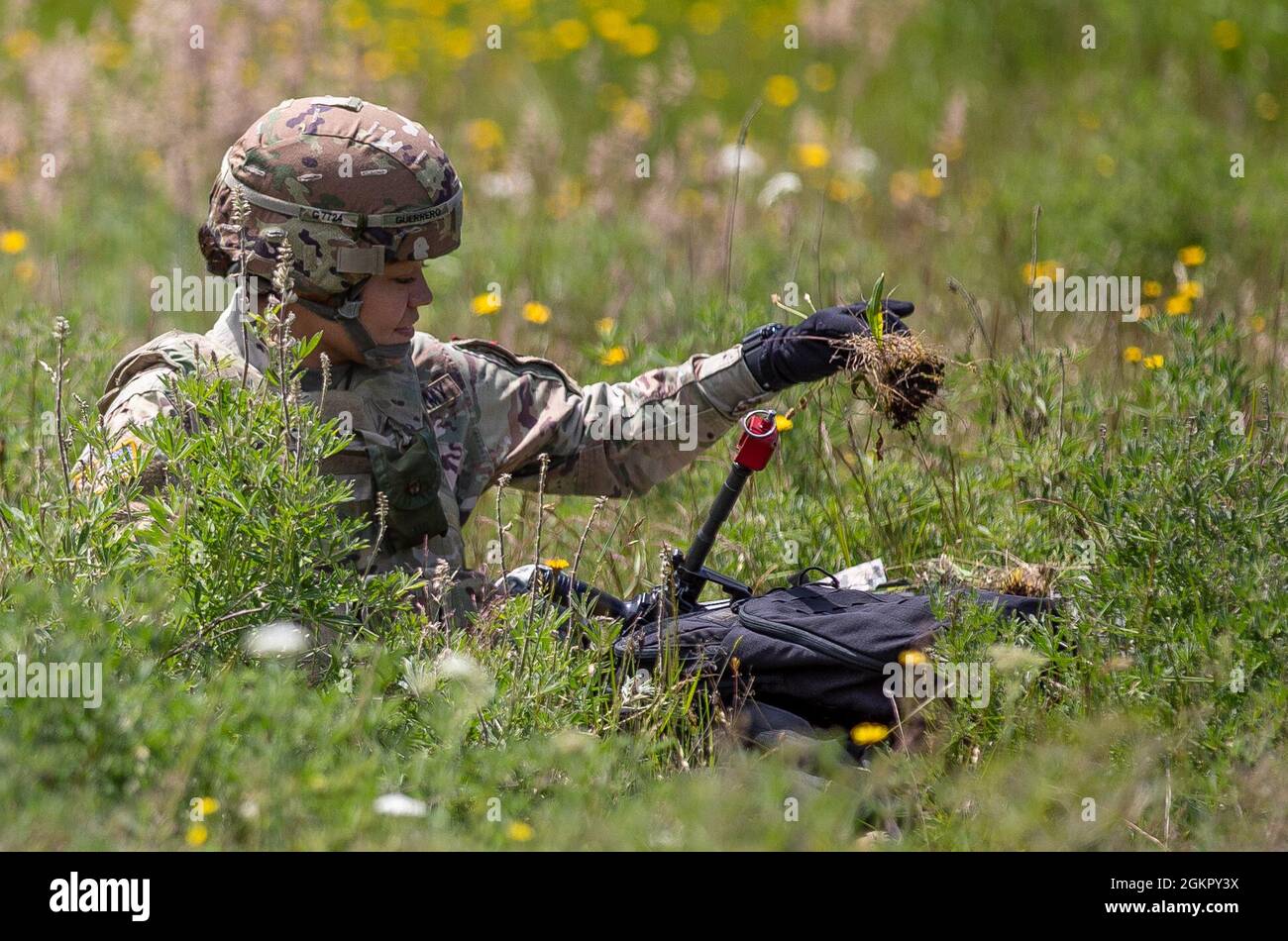Sgt. Sofia Guerrero, from Medical Activity Command - Korea, digs an ...