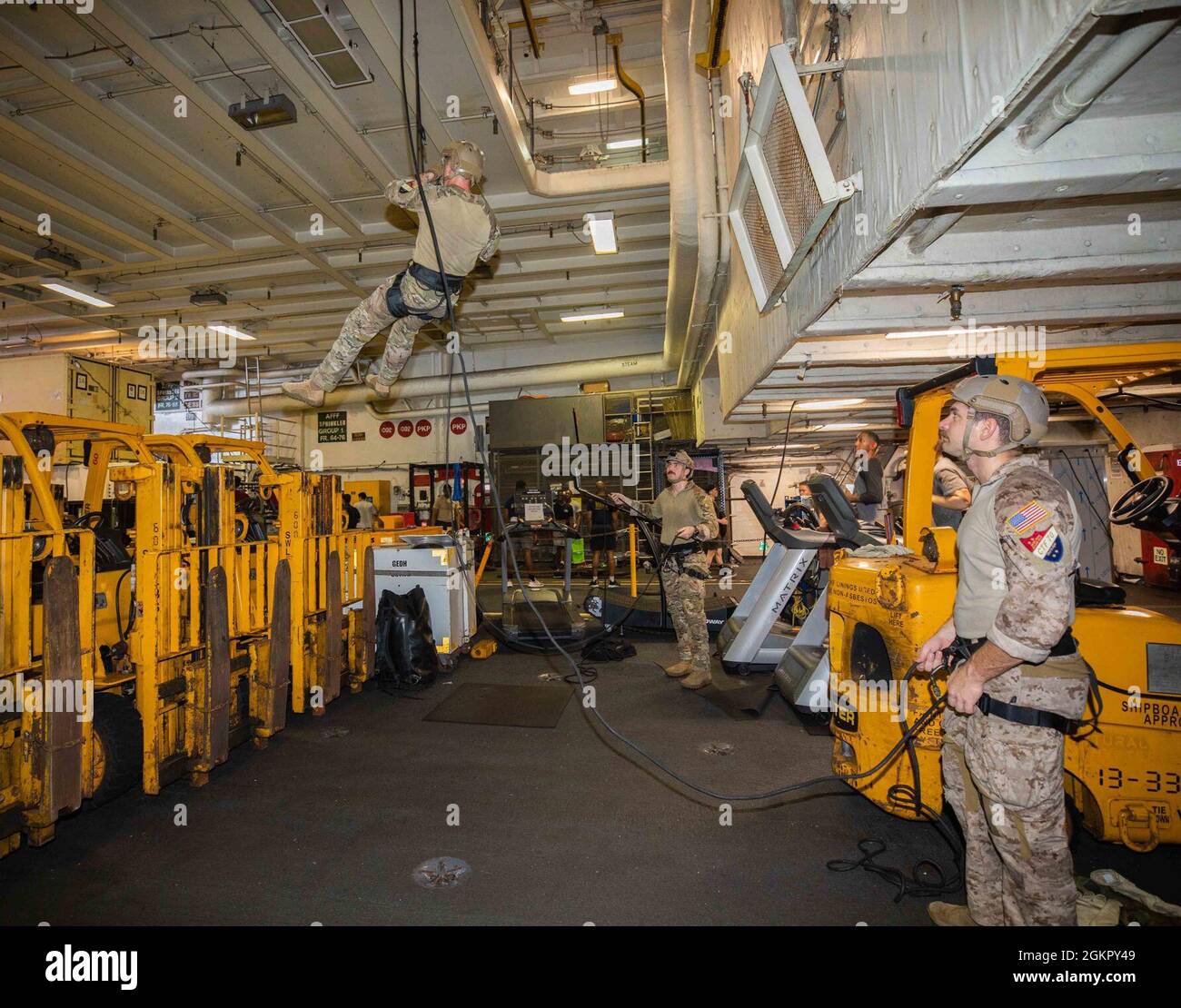 210616-N-NY362-1010 SOUTH CHINA SEA (June 16, 2021) Sailors assigned to ...