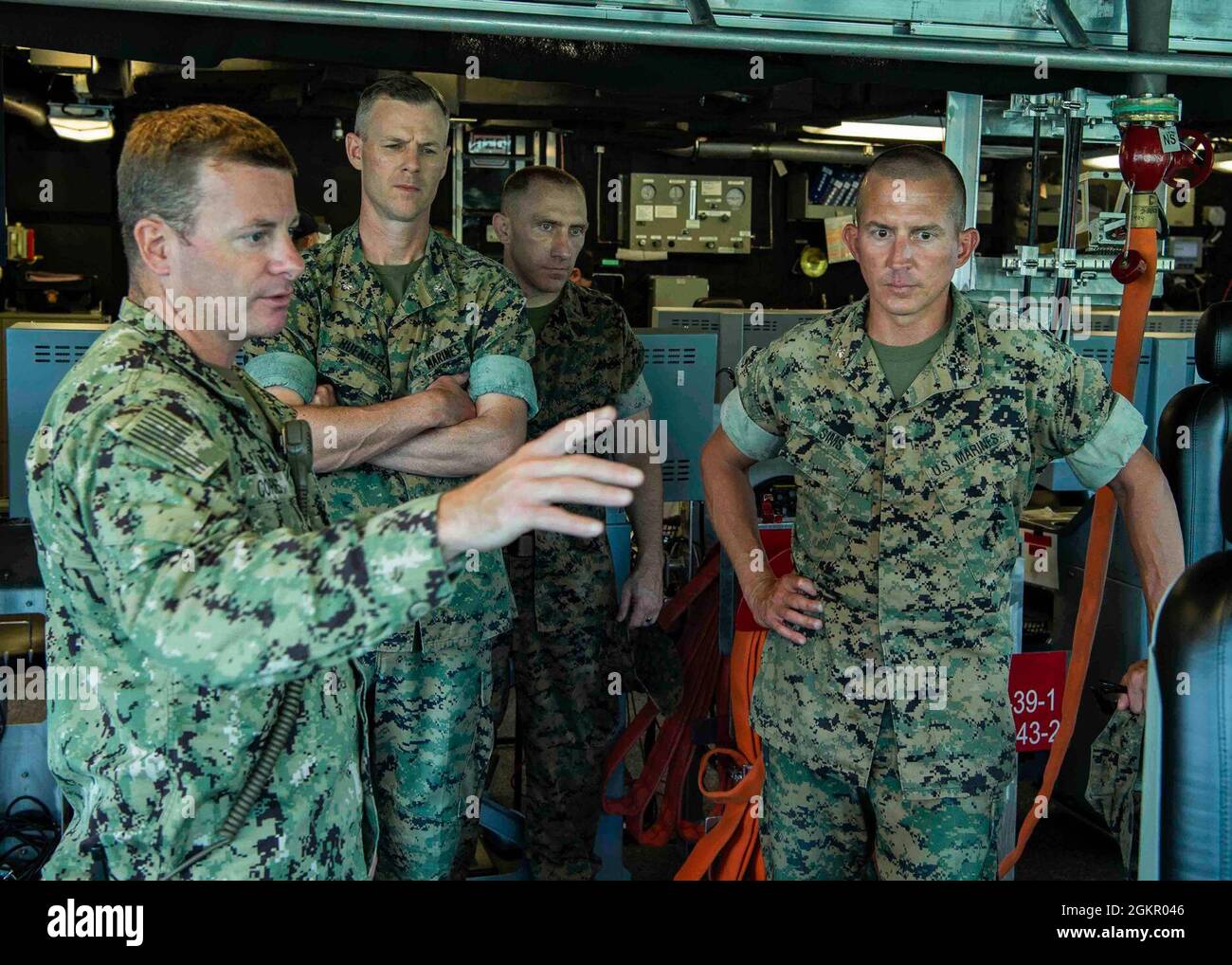 OKINAWA, Japan (June 16, 2021) Cmdr. Brandon J. Cornes, left ...
