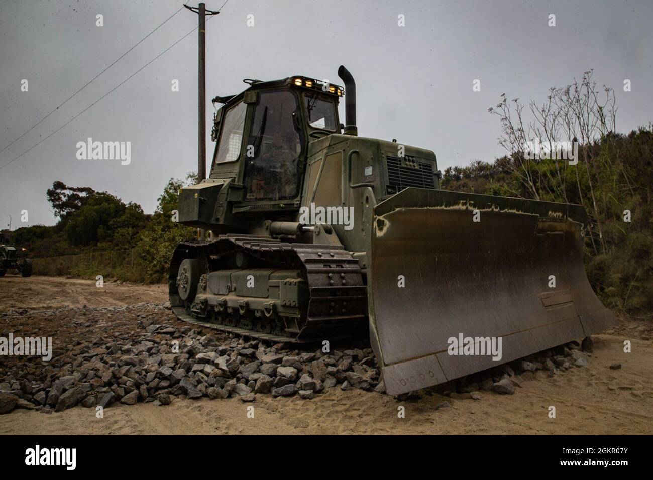 U.S. Marine Corps Lance Cpl. Jacob Hernandez, an engineer equipment ...
