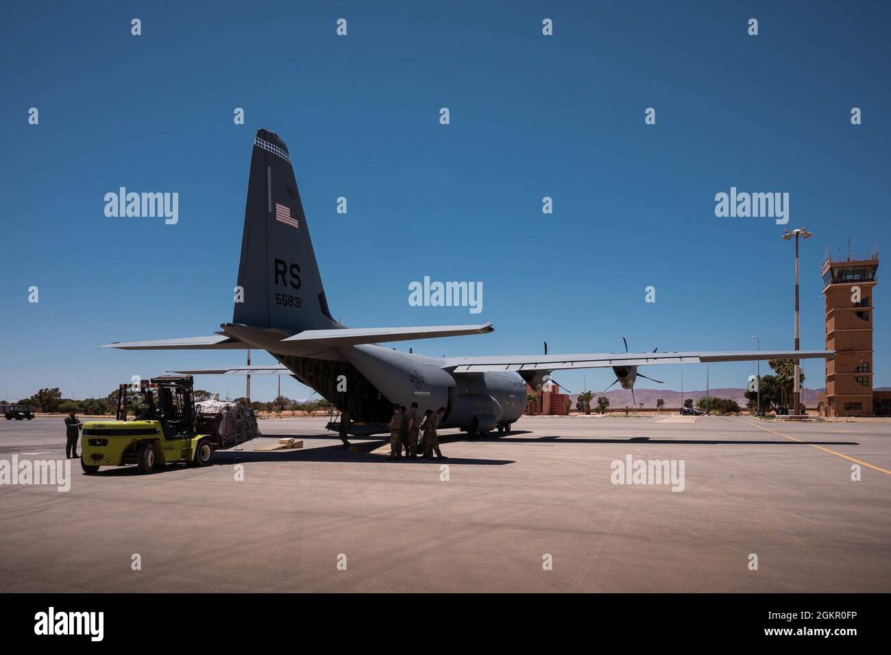 A Royal Moroccan Air Force forklift operator loads a pallet of ...