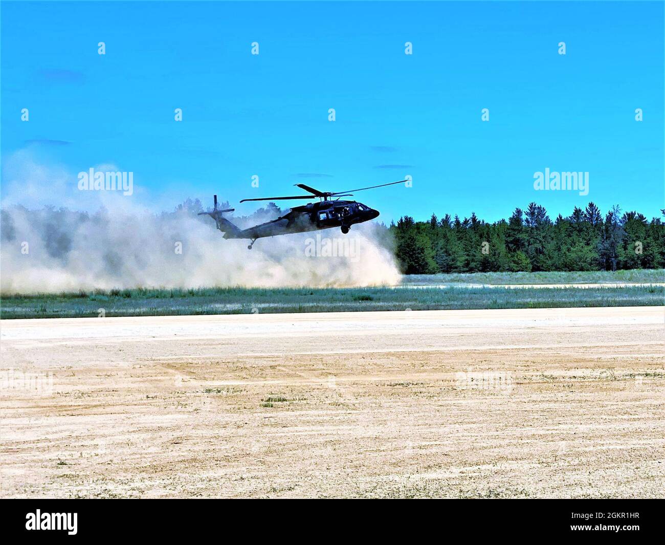 A National Guard helicopter lands at Young Air Assault Strip on June 16 ...
