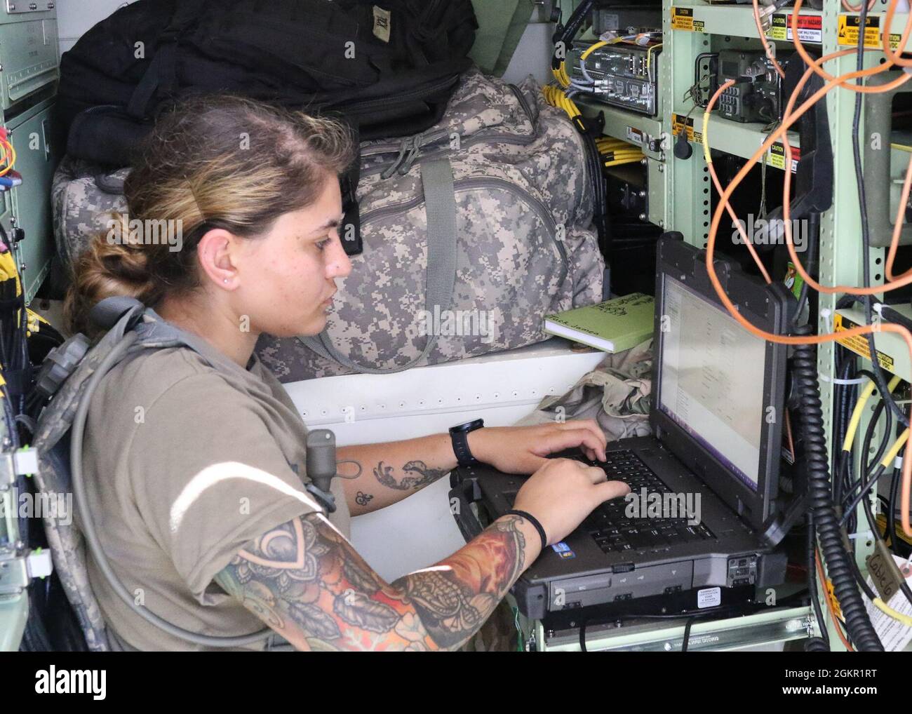 An Ohio National Guard Soldier inputs data into a laptop computer June ...