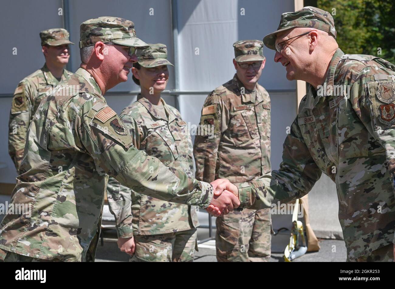 Gen. Arnold W. Bunch, Jr., Air Force Materiel Command commander, shakes ...