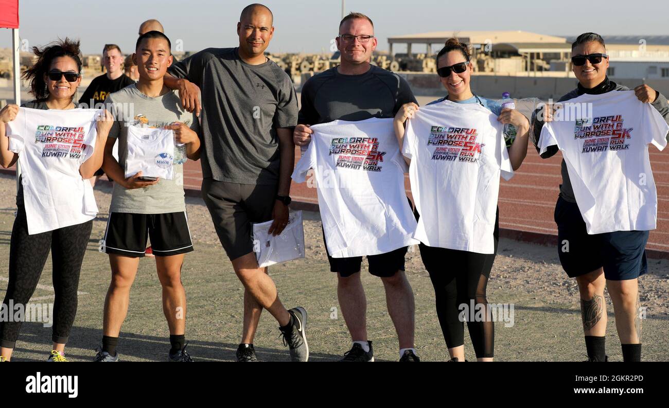 Task Force Phoenix Soldiers show off the shirts they earned after ...