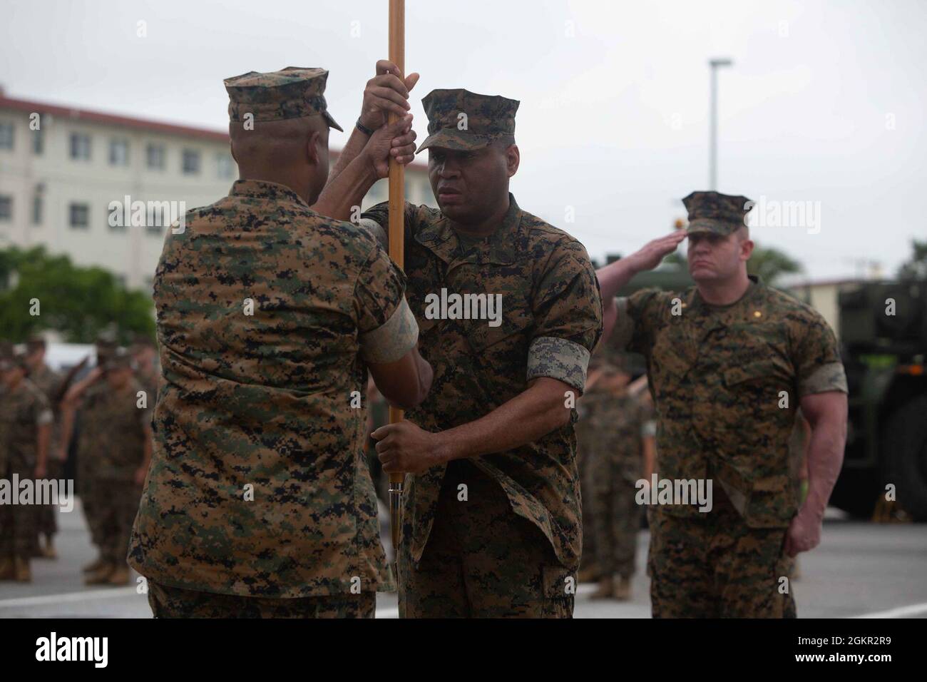 U.S. Marine Corps Sgt. Maj. Deandre Gillon, center, sergeant major of ...