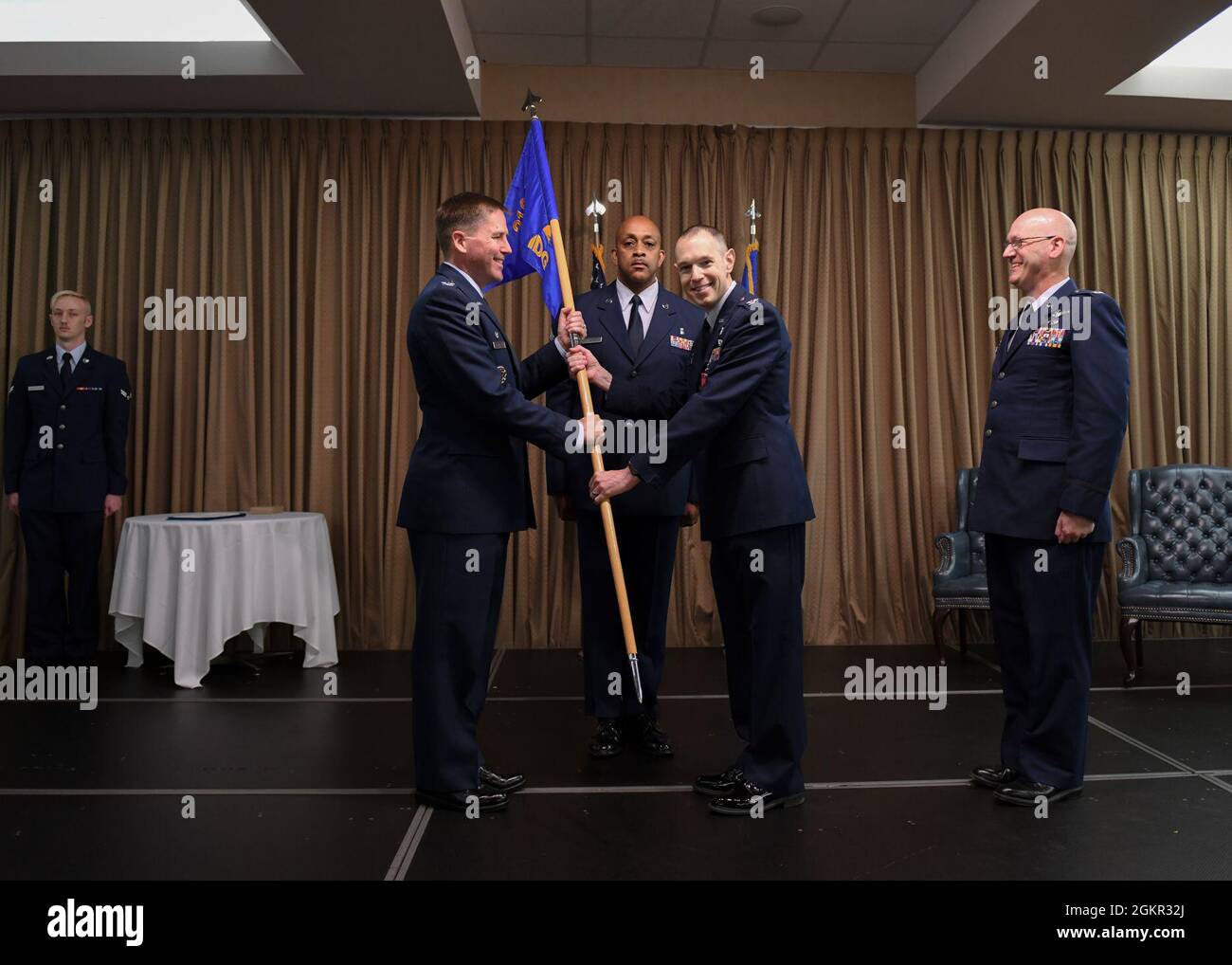 Col. Cameron Pringle, 319th Reconnaissance Wing commander, receives the ...