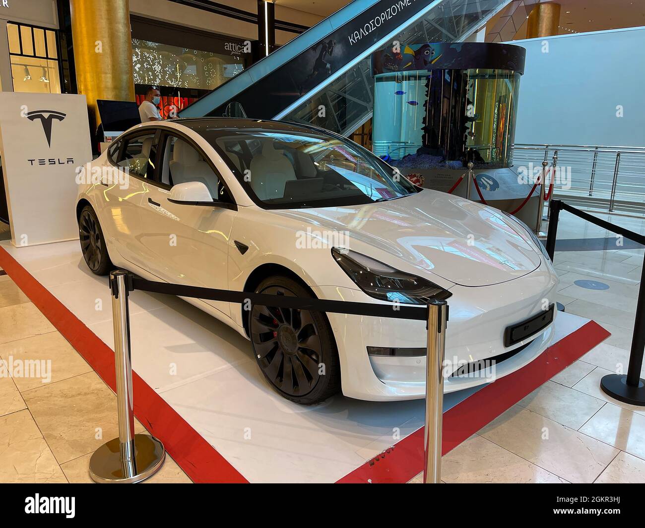 Metallic white Tesla Model 3 at Athens Golden Hall. Produced by ...