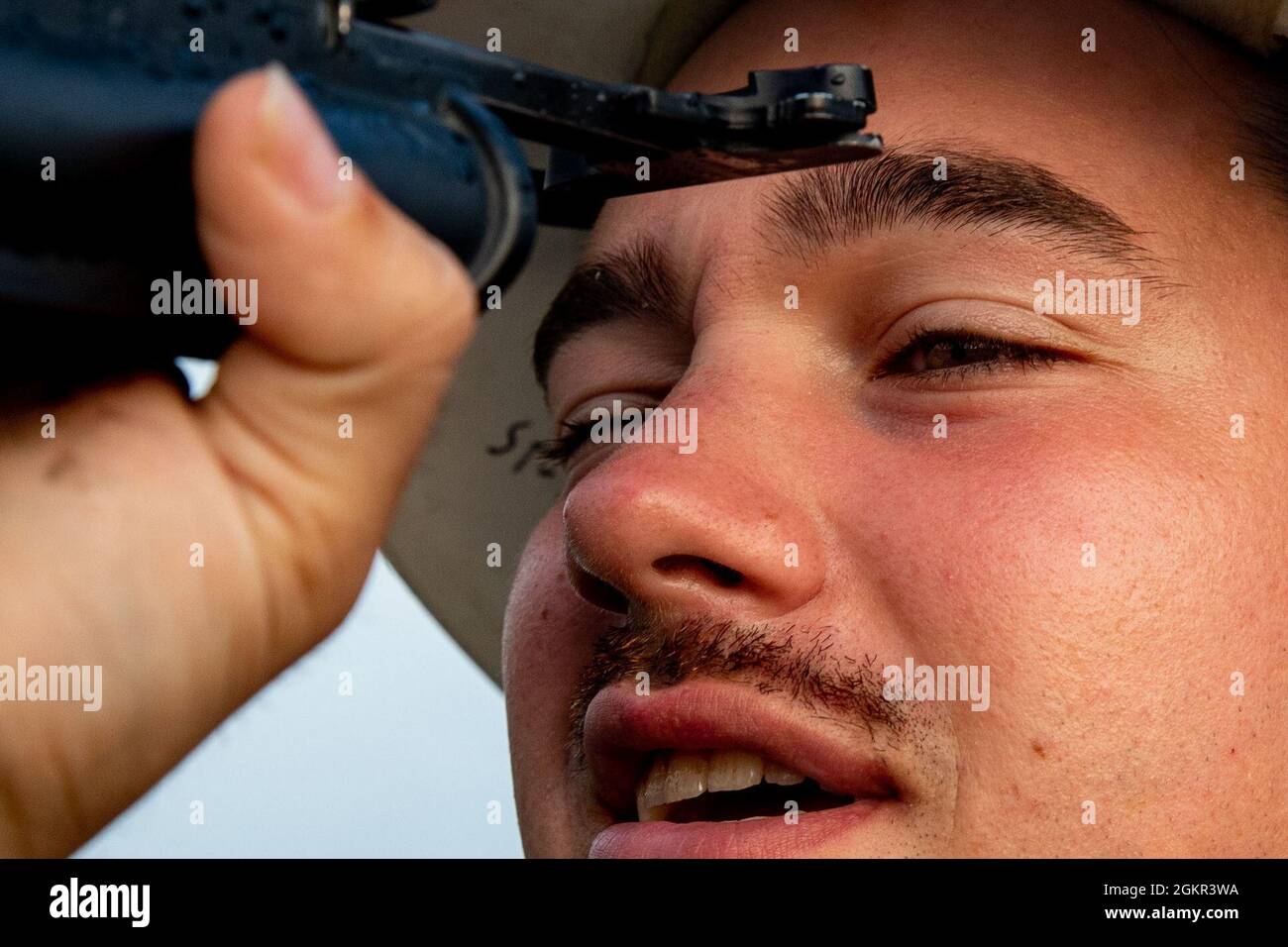U.S. Marine Corps Lance Cpl. Jacob A. Moses, a combat marksmanship ...