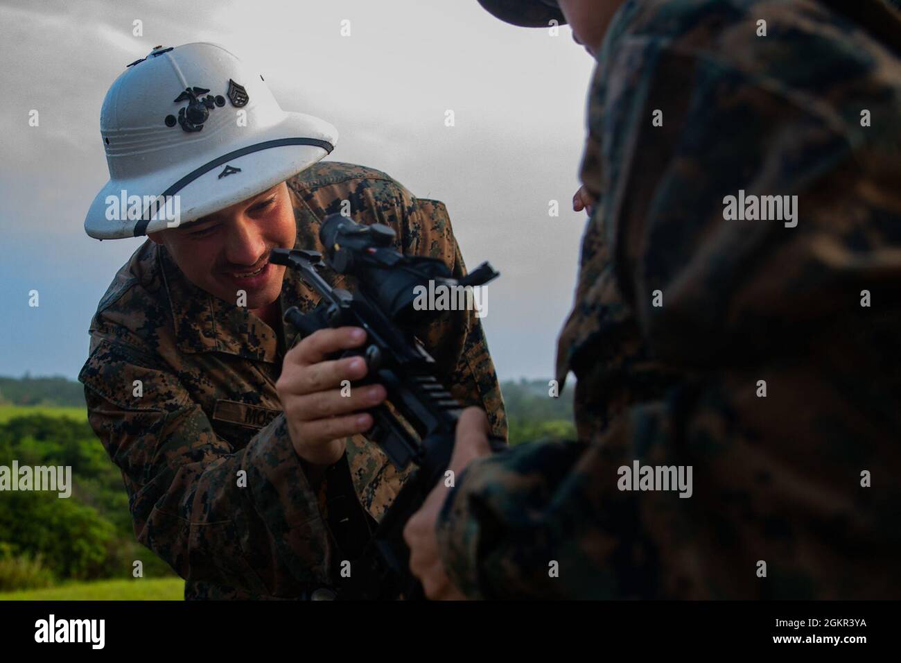 U.S. Marine Corps Lance Cpl. Jacob A. Moses, a combat marksmanship ...