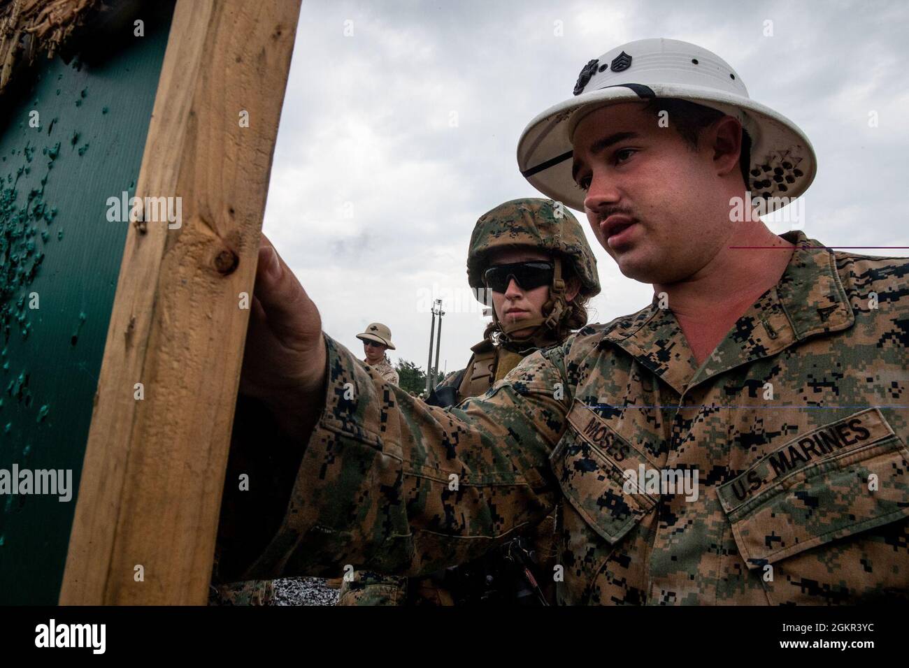 U.S. Marine Corps Lance Cpl. Jacob A. Moses, a combat marksmanship ...