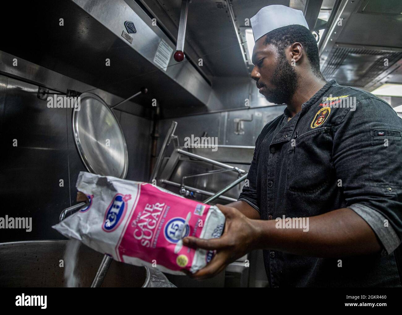 210617-N-XU073-1168 SOUTH CHINA SEA (June 17, 2021) – Culinary Specialist 3rd Class Curtis Lynch ...