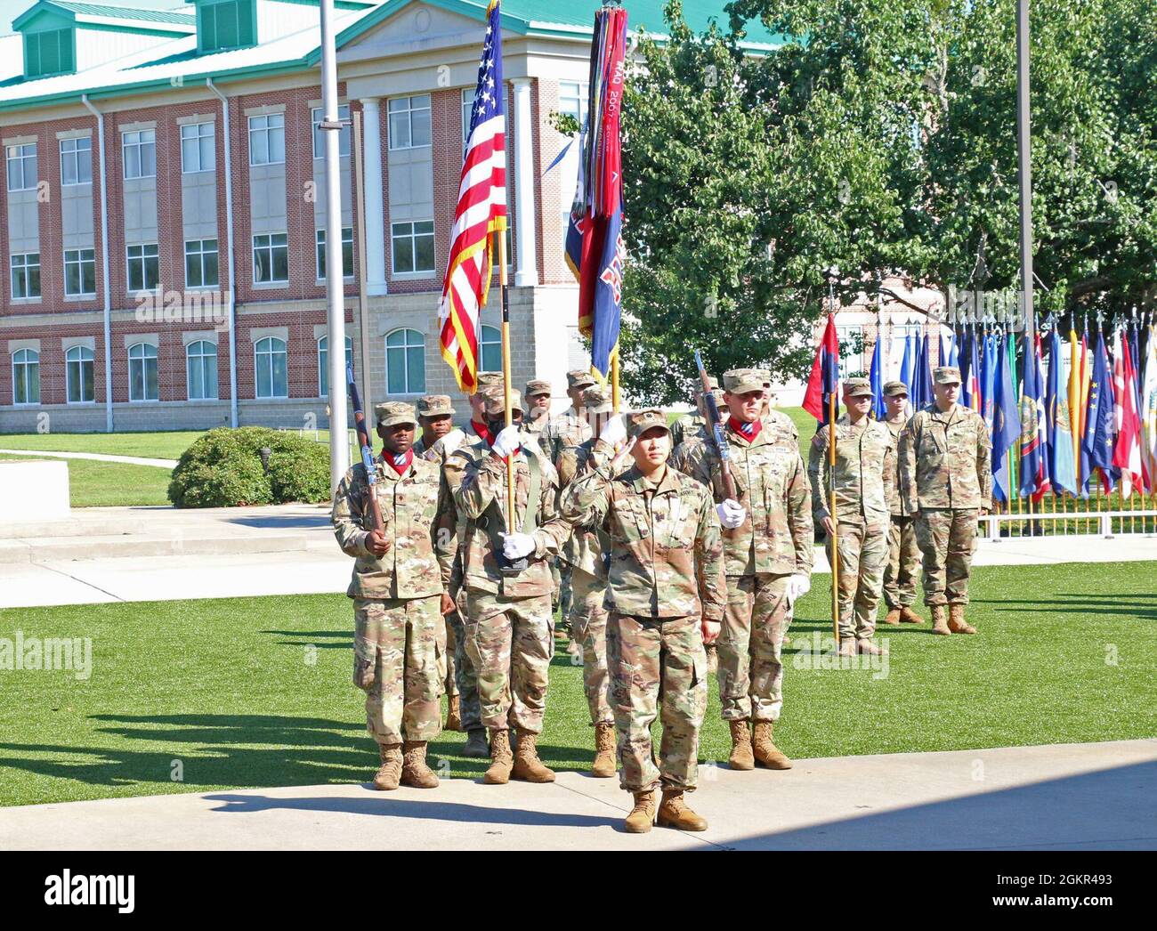 Lt. Col. Kelly L. Markin stands in front of members of the Headquarters ...