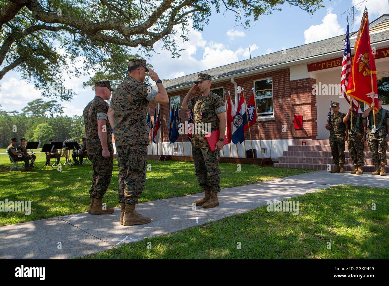 U.S. Marine Corps Lt. Col. Lynn W. Berendsen, right, the outgoing ...
