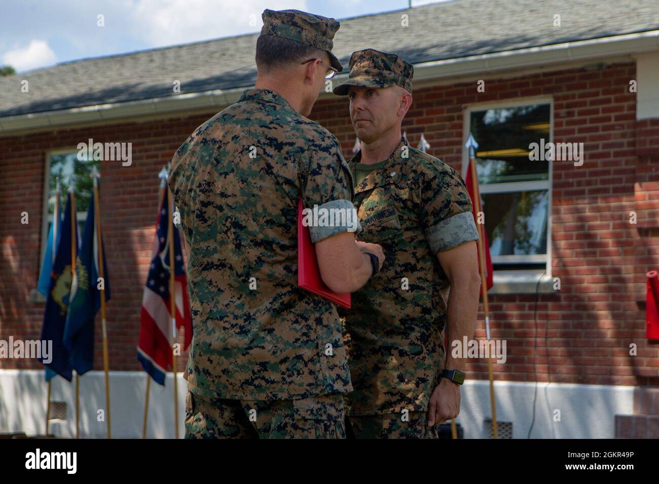 U.S. Marine Corps Lt. Col. Lynn W. Berendsen, right, the outgoing ...