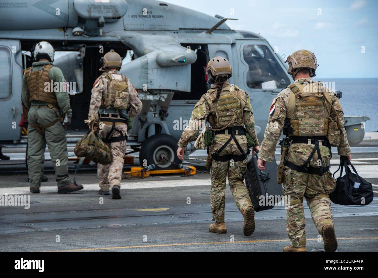 210617-N-WS494-1099 SOUTH CHINA SEA (June 17, 2021) Sailors assigned to ...