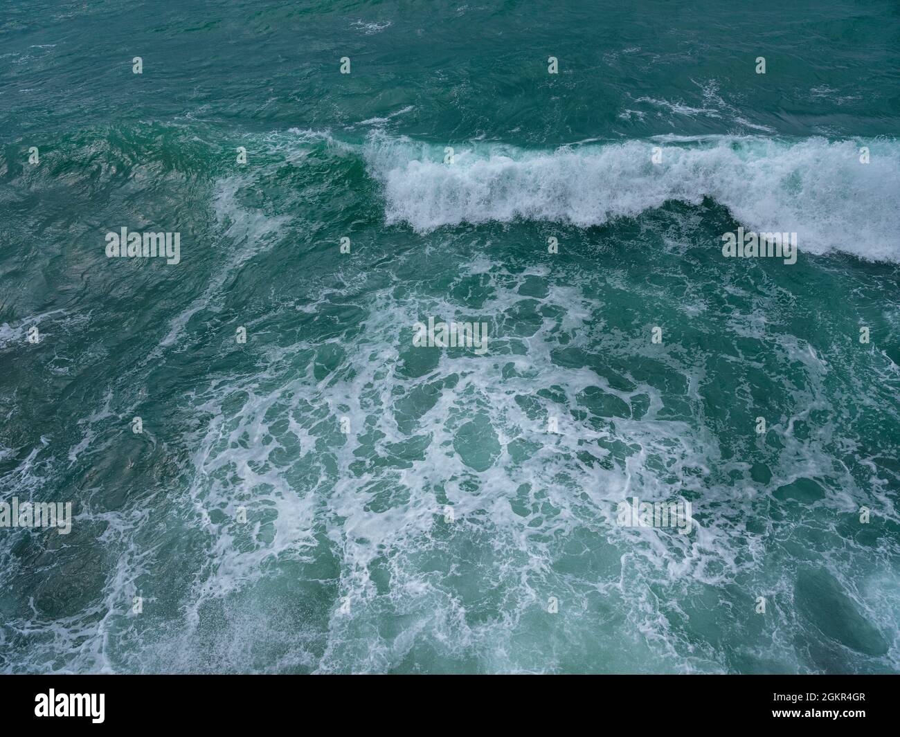 Beautiful view of ocean waves and a fantastic rocky shore, Sea patterns ...