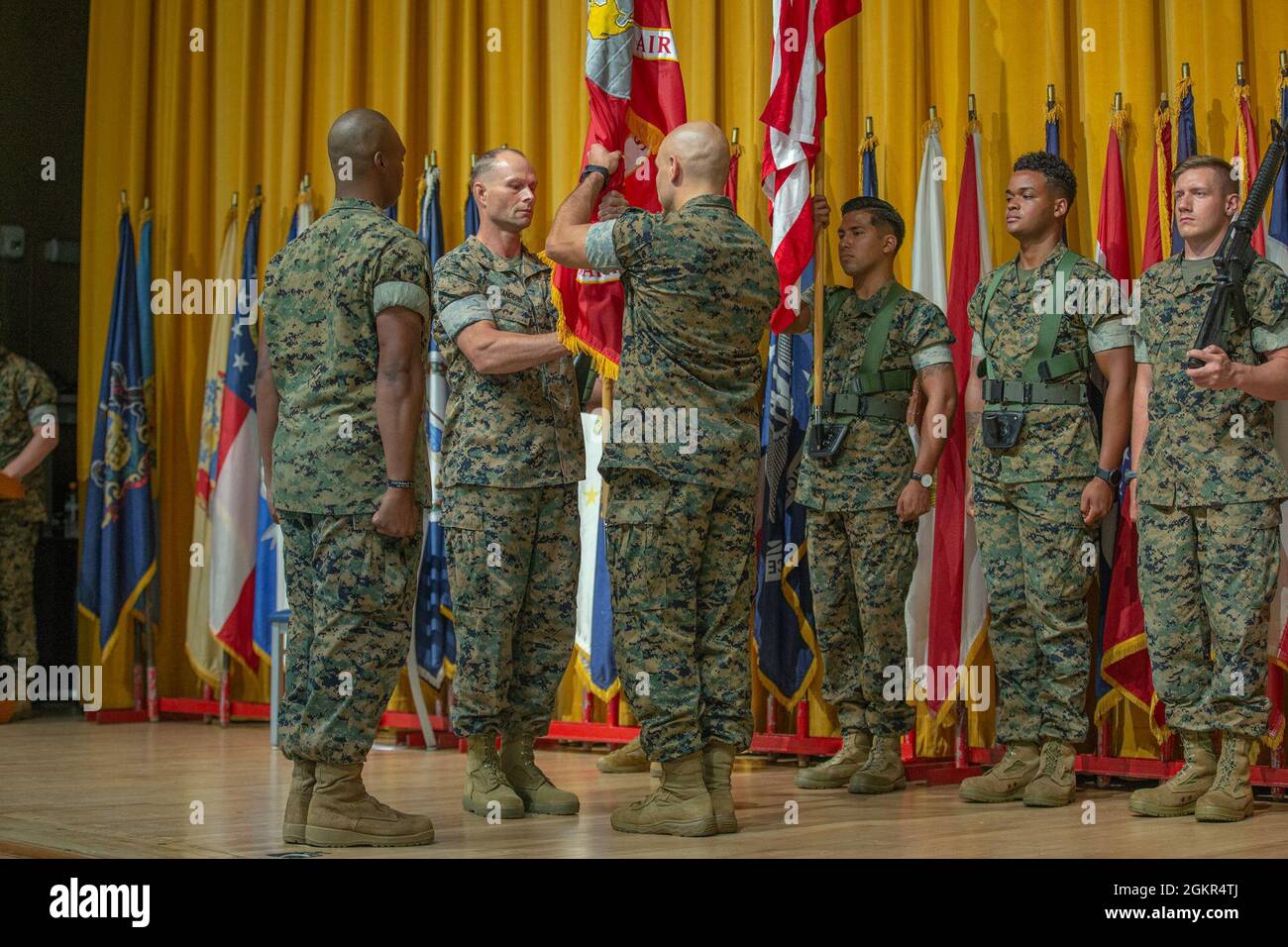 U.S. Marine Corps Lt. Col. Justin Sanders, left, relinquishes command ...