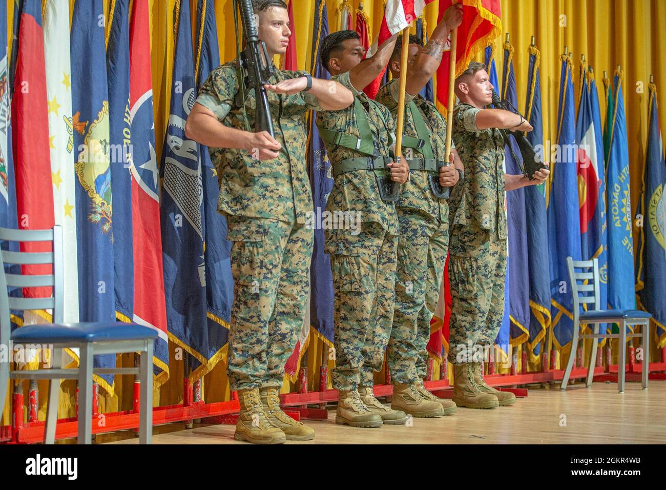 Marine Air Support Squadron (MASS) 2 color guard present arms during a ...
