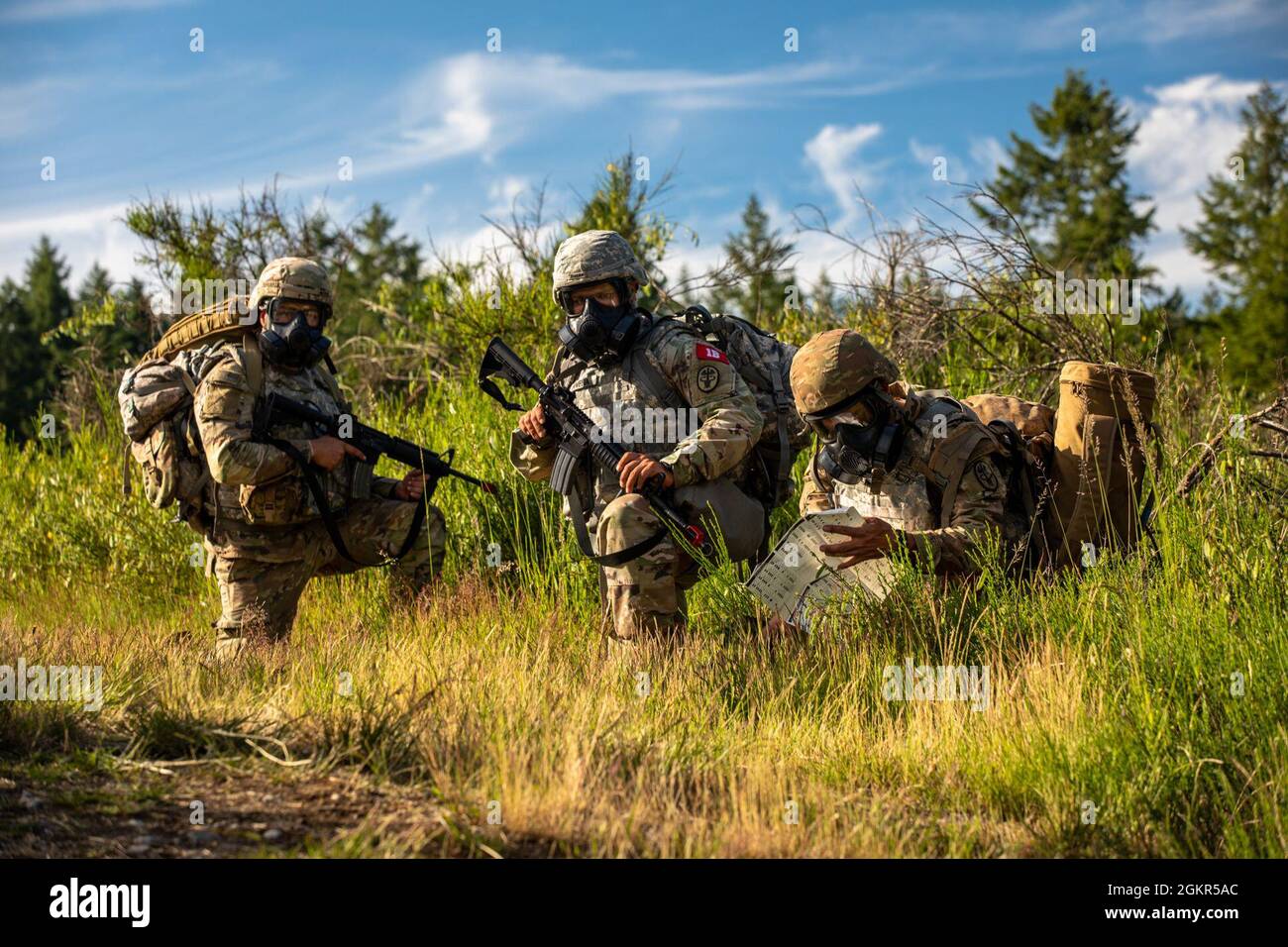 Spc. Jarrett Rodriguez (left), Staff Sgt, Israel Rivera (middle) and ...