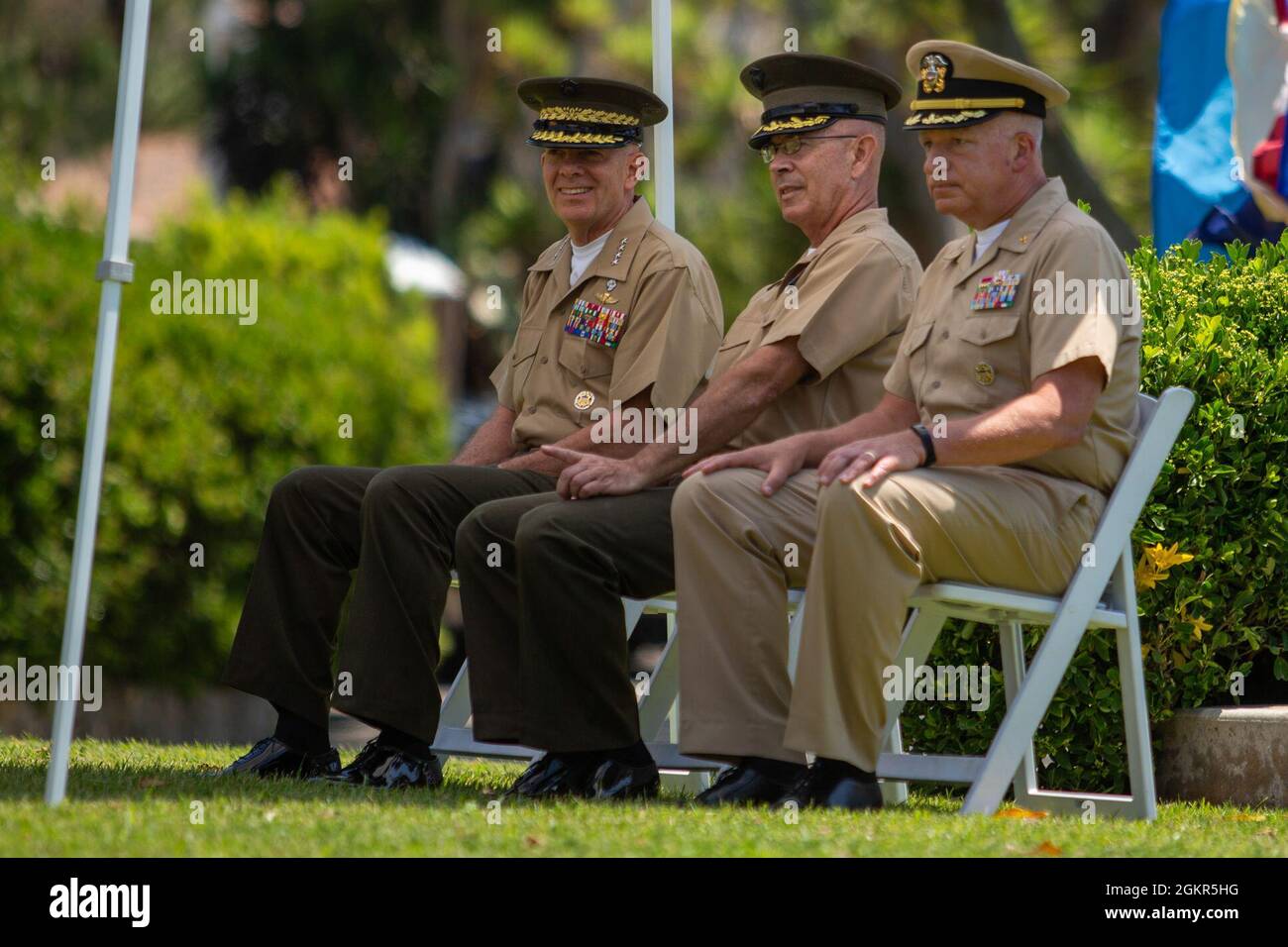 U.S. Marine Gen. David H. Berger, left, the commandant of the Marine ...