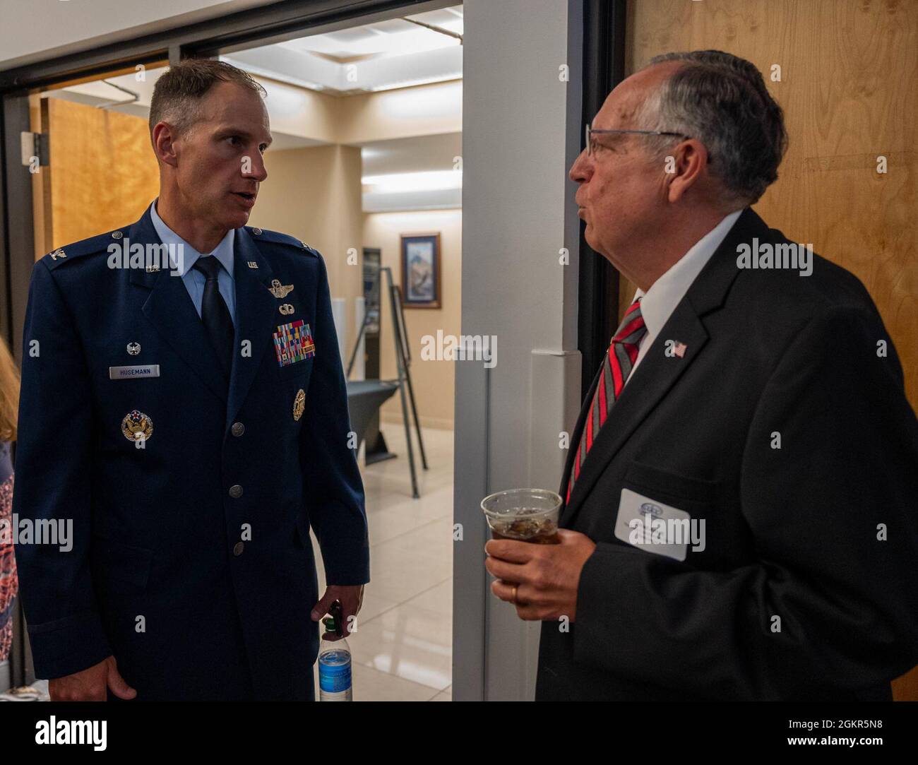 Col. Matt Husemann, 436th Airlift Wing commander, right, speaks with ...