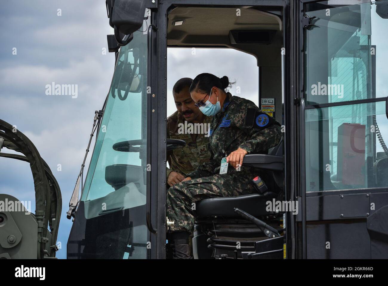 U.S. Air Force Staff Sgt. Francisco Quintana, left, a small air ...