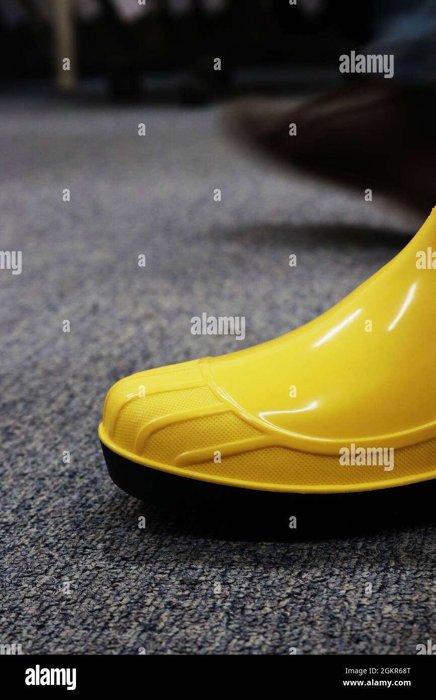 boots made of rubber. Workers wear these shoes when in wet and dirty ...