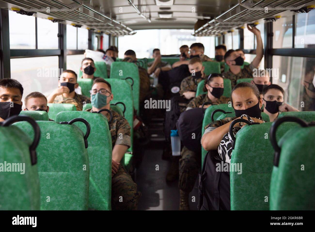U.S. Marines with Marine Fighter Attack Squadron (VMFA) 232 sit on a ...