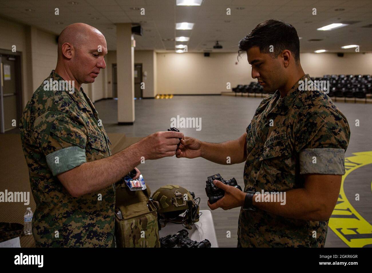 U S Marine Corps Chief Warrant Officer 4 David Tomlinson Left The
