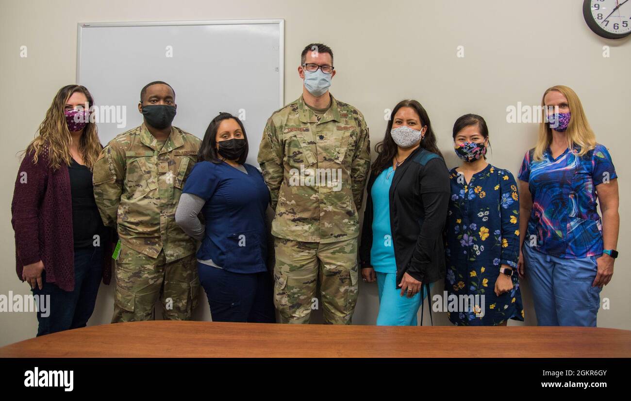 Team members from the Transgender Health Medical Evaluation Unit pose ...