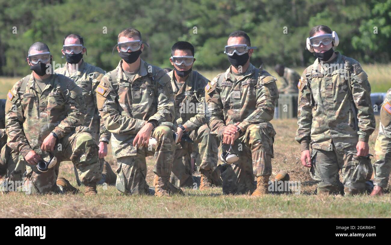 Soldiers from the 262nd Quartermaster Battalion watch as a Black Hawk ...
