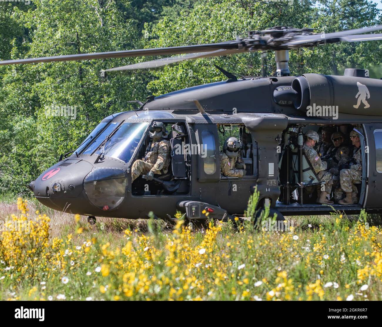 Soldiers assigned to Bravo "Bigfoot" Company, 2-158 Assault Helicopter ...