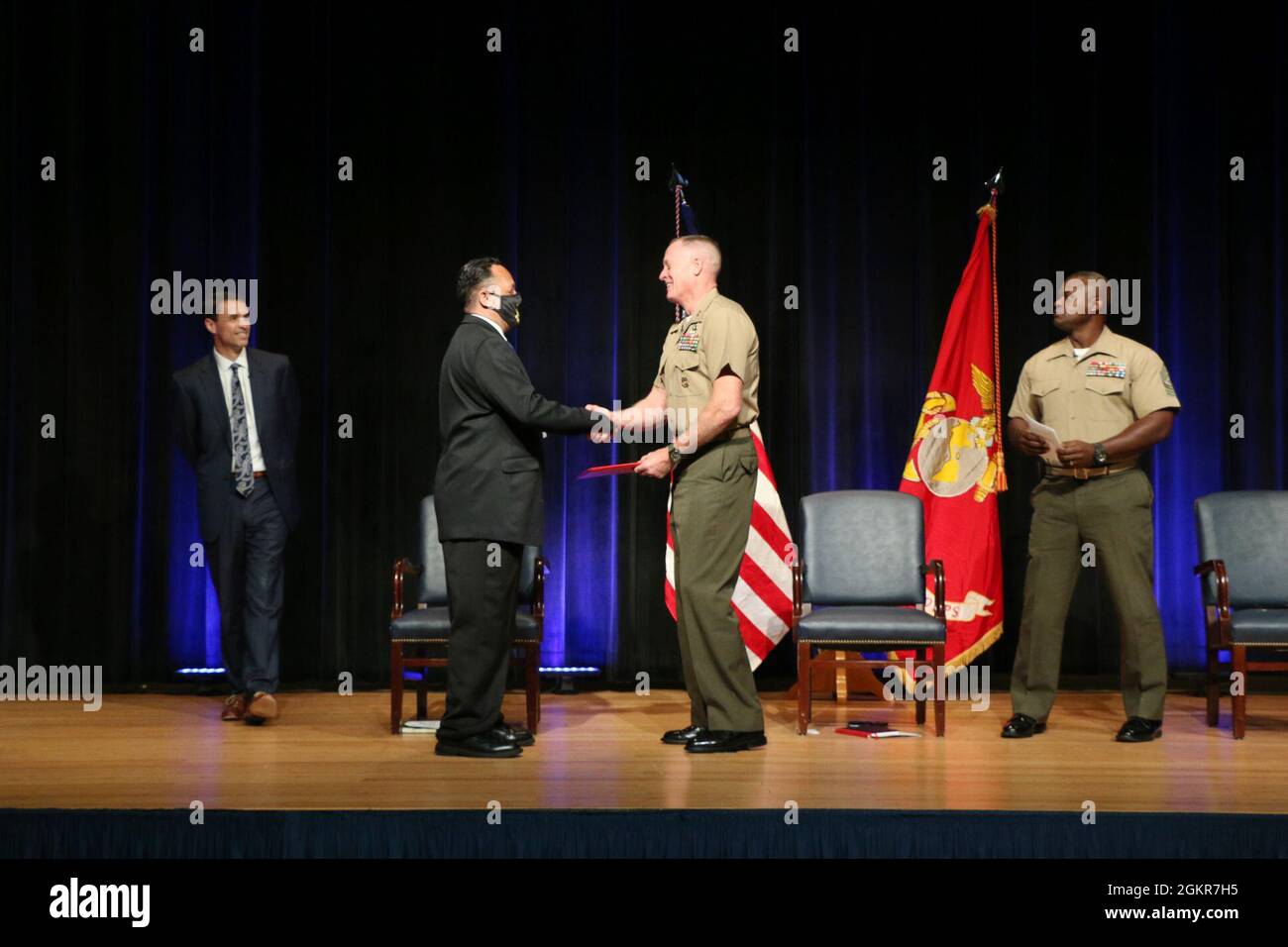 Major General (MajGen) Edward Banta presents Louis Zamora with the ...