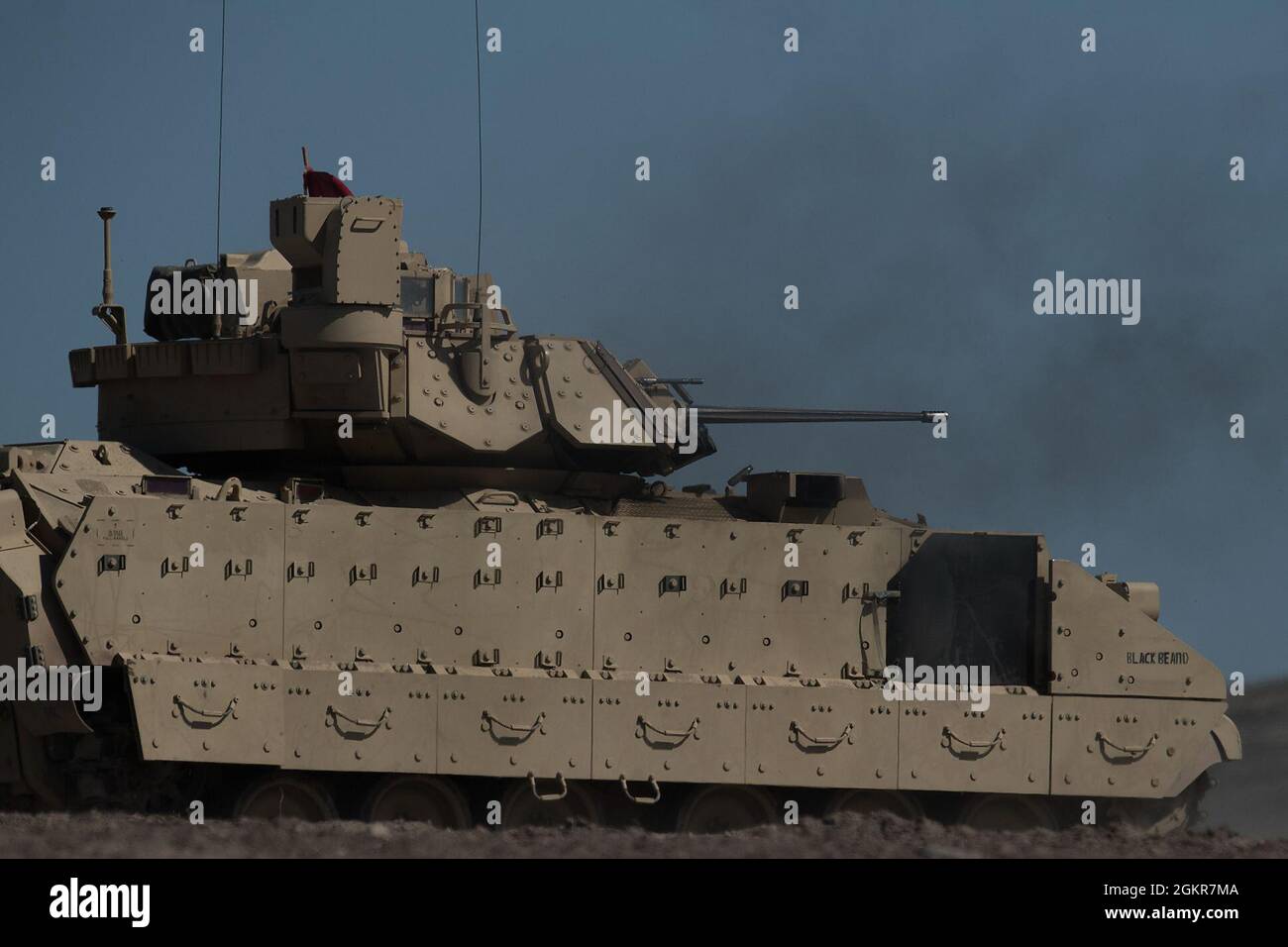 A combat engineer Bradley Fighting Vehicle begins firing its 25 mm main ...